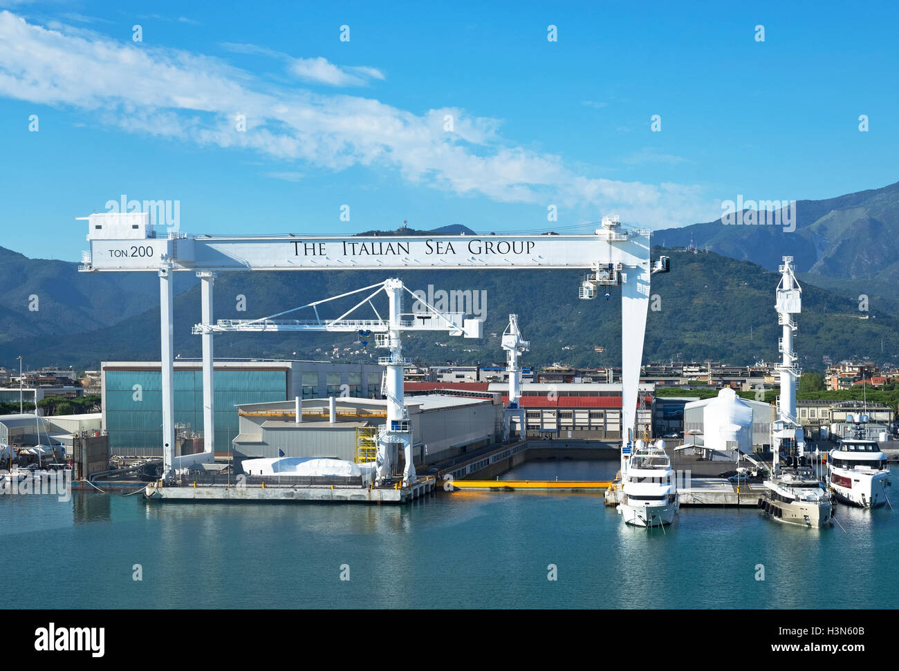 The industrial port at Marina di Carrara, Tuscany, Italy Stock Photo ...