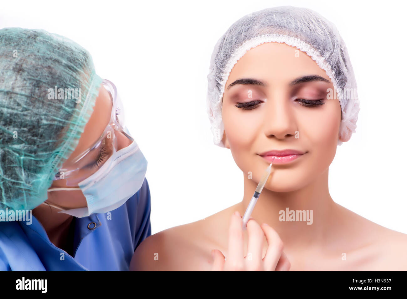 Young woman preparing for plastic surgery isolated on white Stock Photo ...