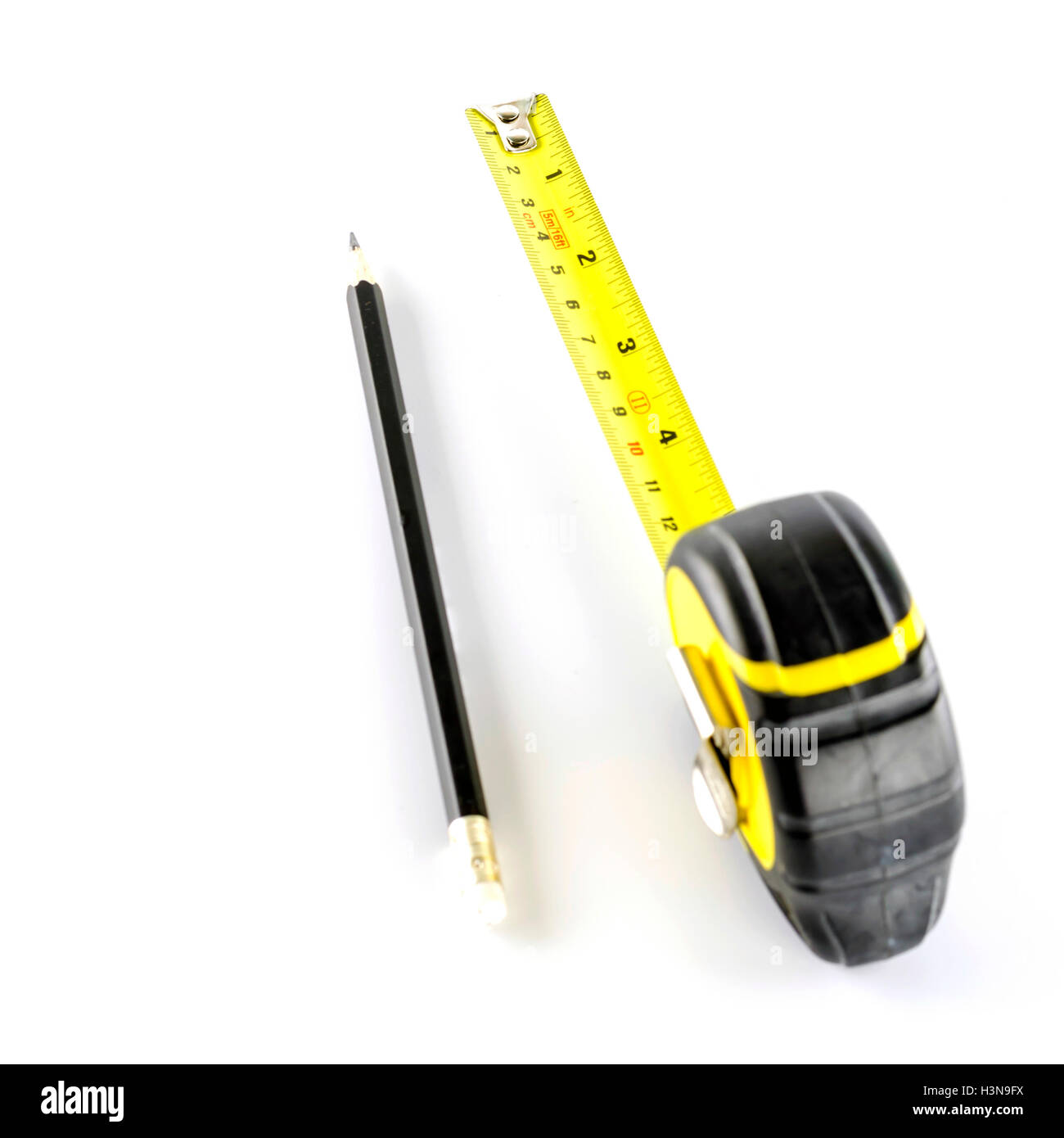 measuring tape with pencil Stock Photo - Alamy