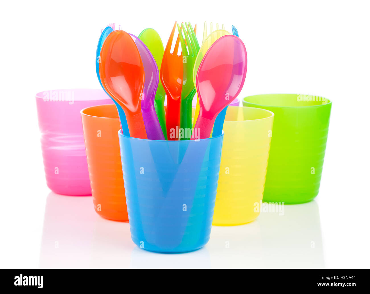 bright plastic tableware, isolated on white background Stock Photo - Alamy