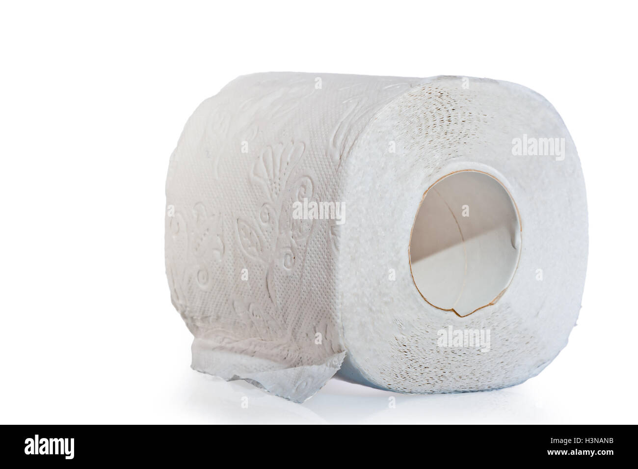three layer roll of toilet paper on a white background Stock Photo - Alamy
