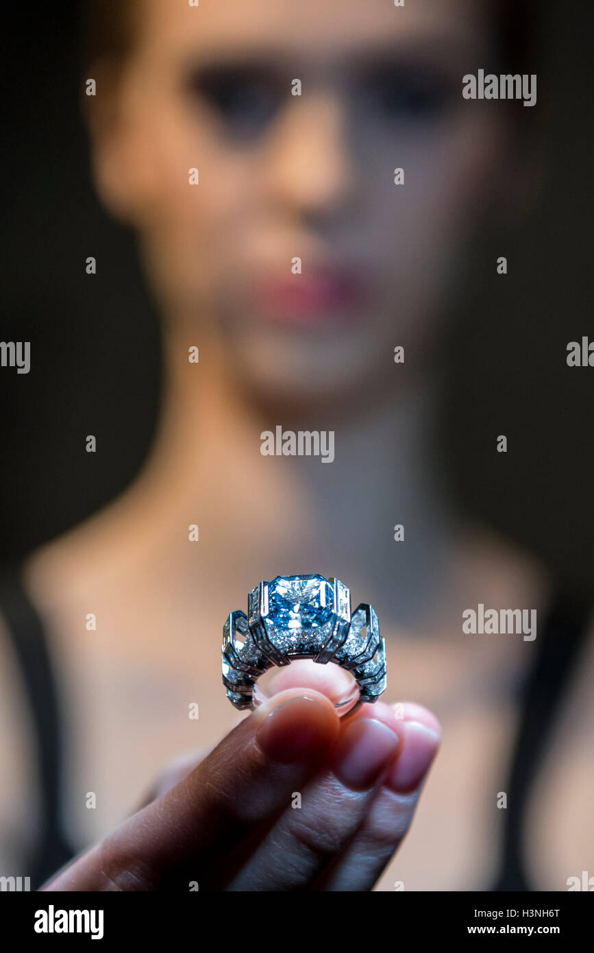 London , UK. 11 October 2016. A model shows a rare fancy vivid blue ...