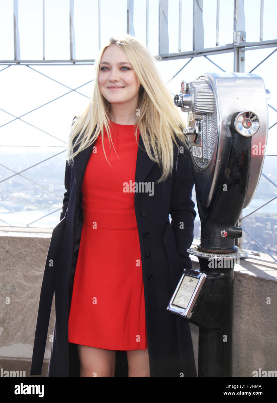 New York, USA. 11th October, 2016. Dakota Fanning lights The Empire ...