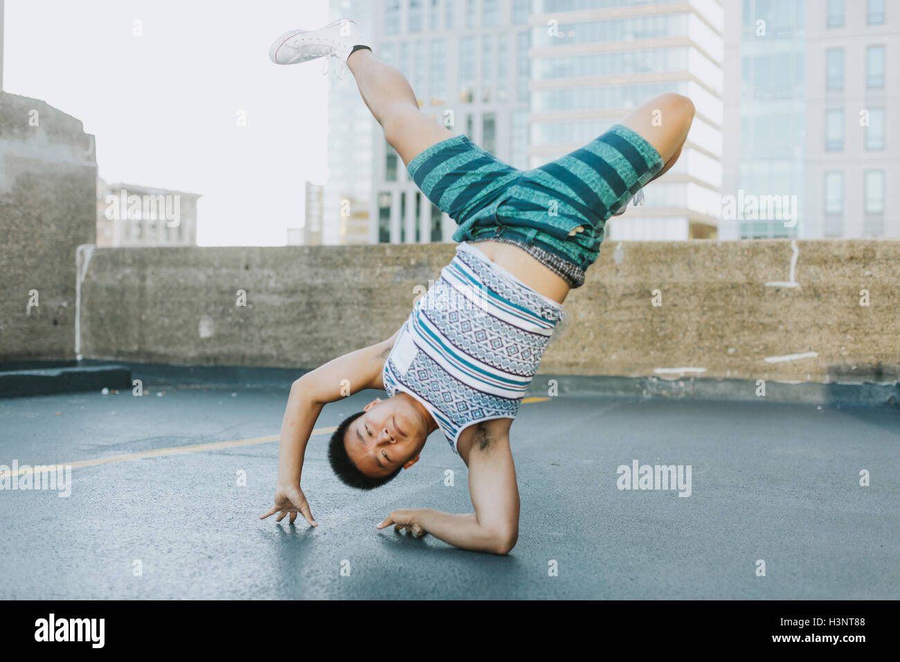 Man breakdancing on concrete floor, Boston, Massachusetts, USA Stock ...