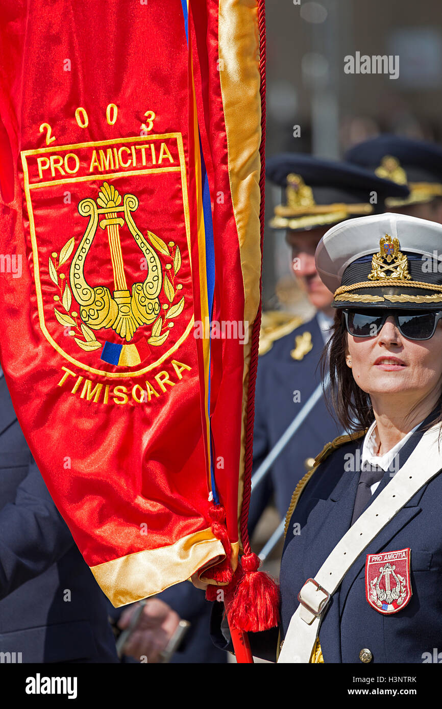 TIMISOARA, ROMANIA - SEPTEMBER 25, 2016: Military parade with unit flag ...