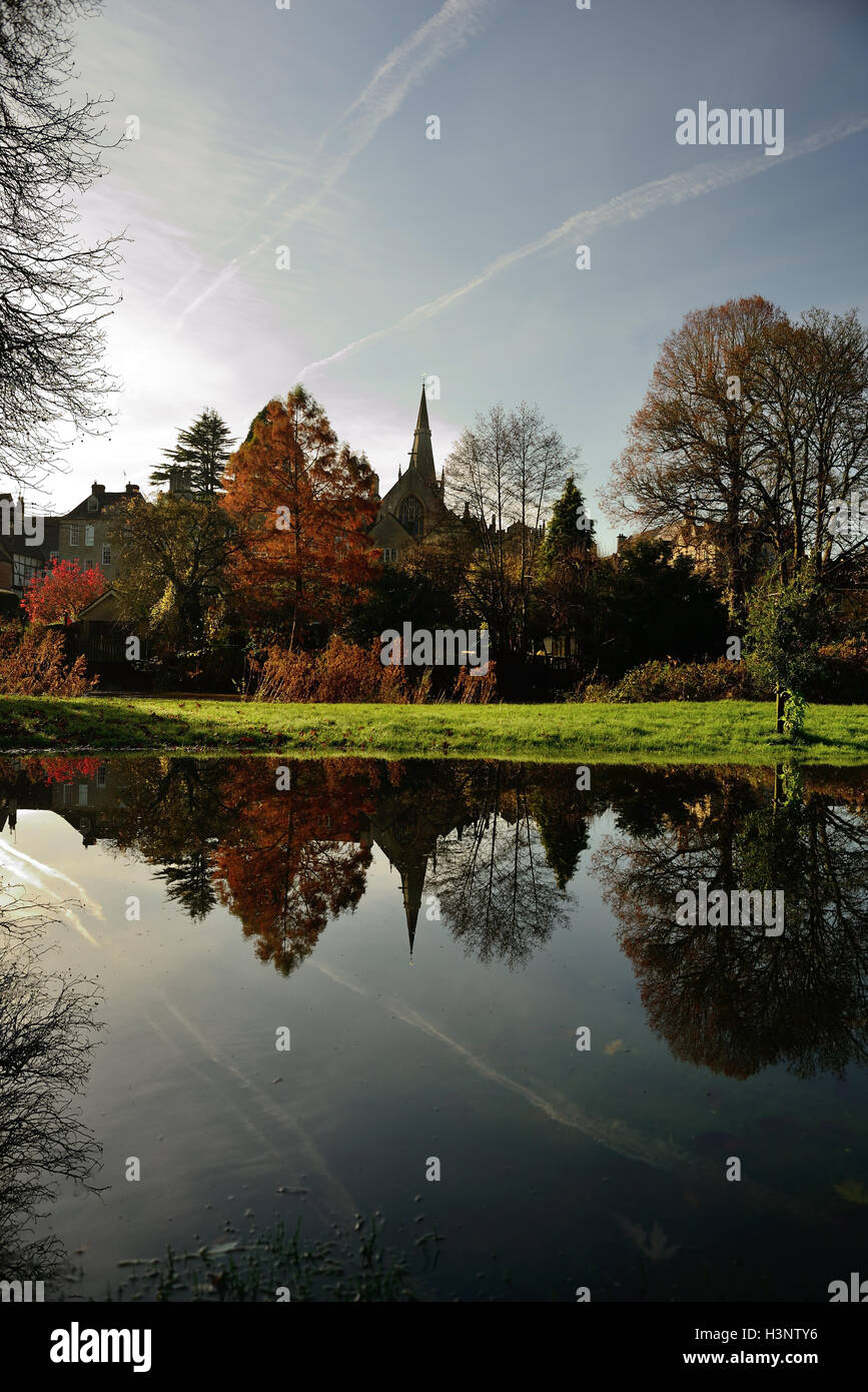 Autumn reflections in floodwater beside the river Avon in Chippenham ...