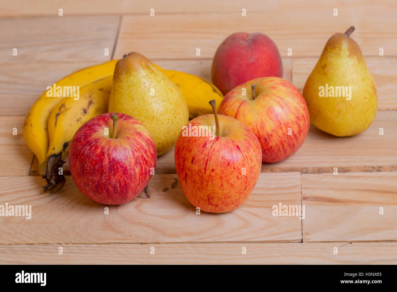 fruits on wooden table, studio picture Stock Photo - Alamy