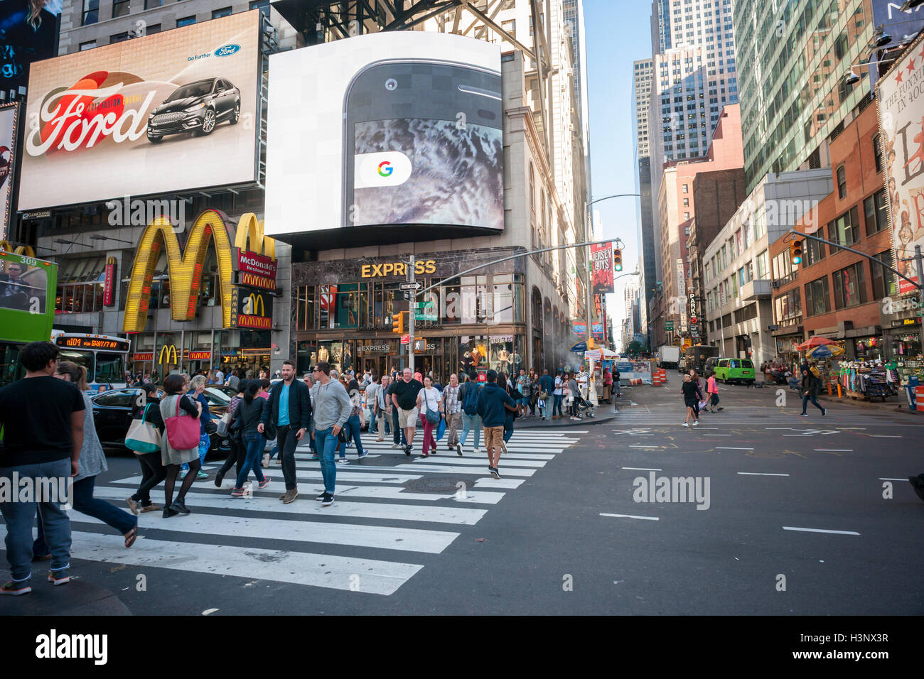 A giant illuminated video display in Times Square in New York promotes ...