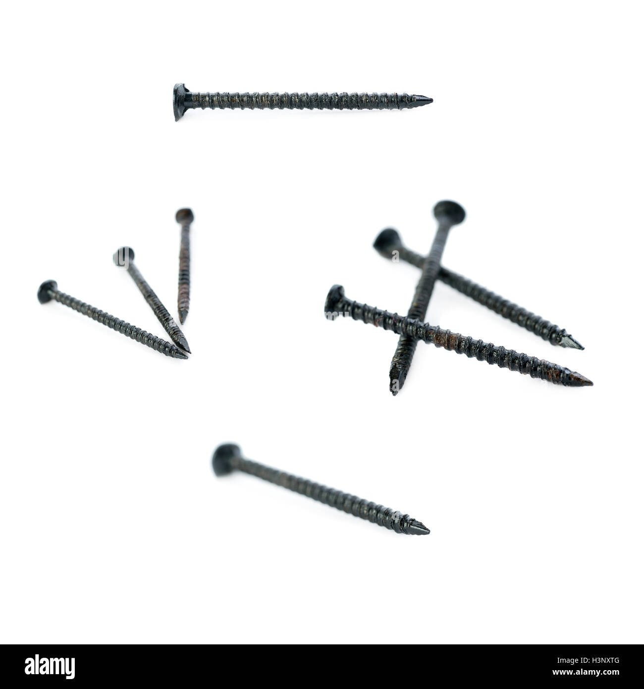 Metal nail isolated over the white background Stock Photo - Alamy