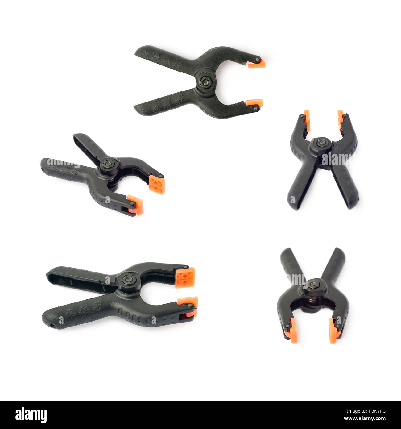 Set of Clamp with orange plastic jaws, isolated over the white ...