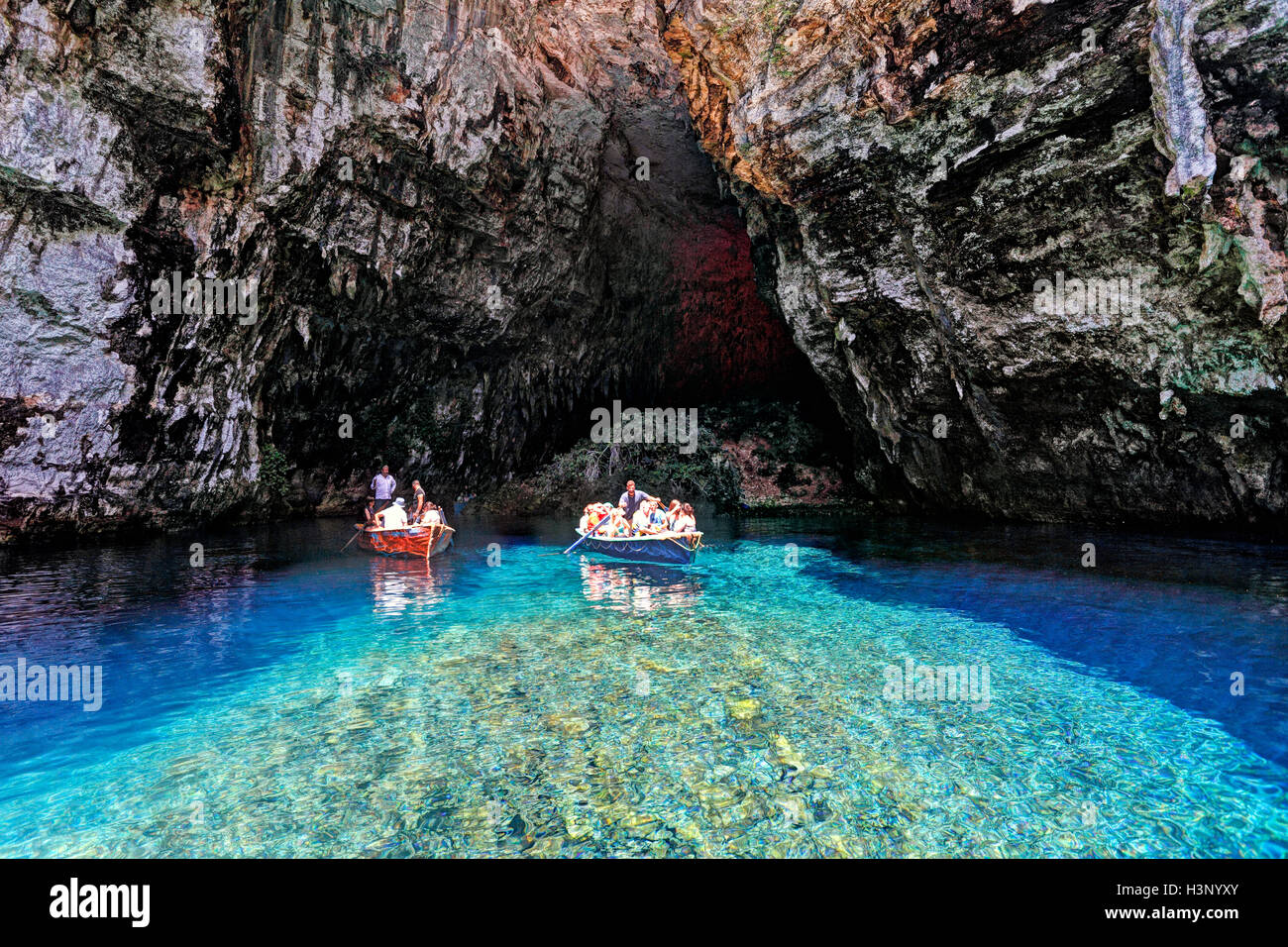 The tour in the cave of Melissani lake in Kefalonia island, Greece ...