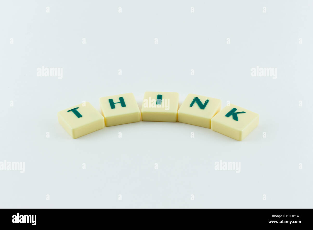 Letters forming the word THINK in arc shape Stock Photo - Alamy