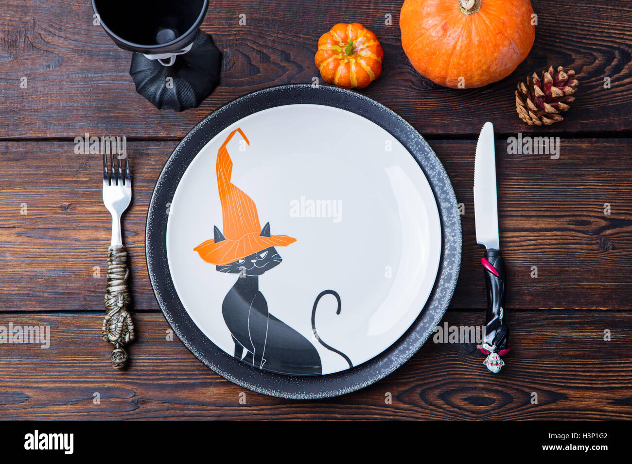 Halloween table setting decoration. Top view Stock Photo - Alamy