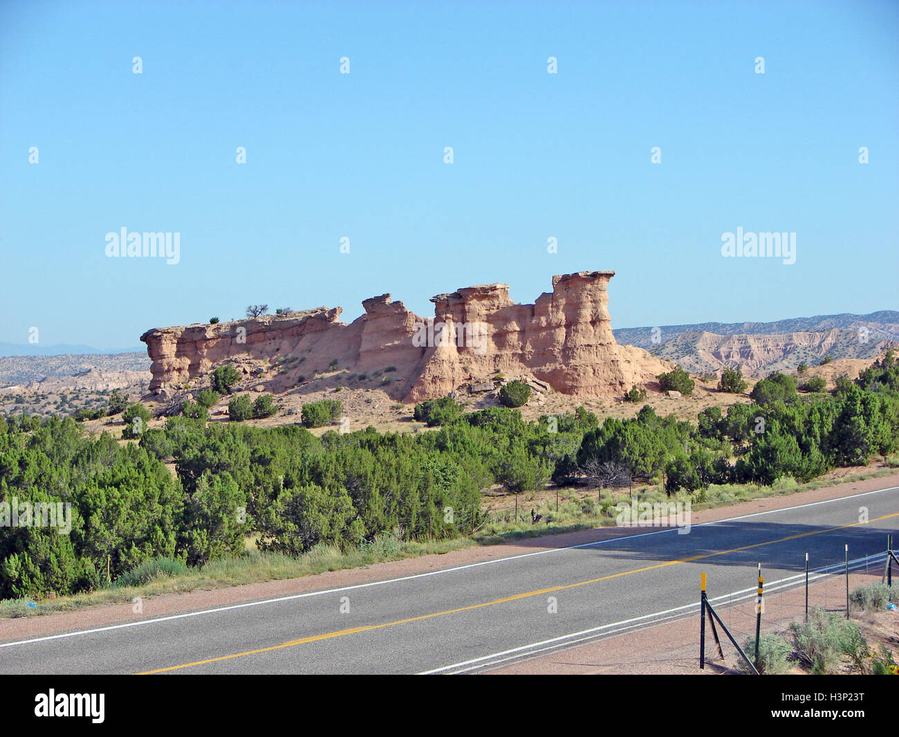 A sandstone mesa in a desert scene Stock Photo - Alamy