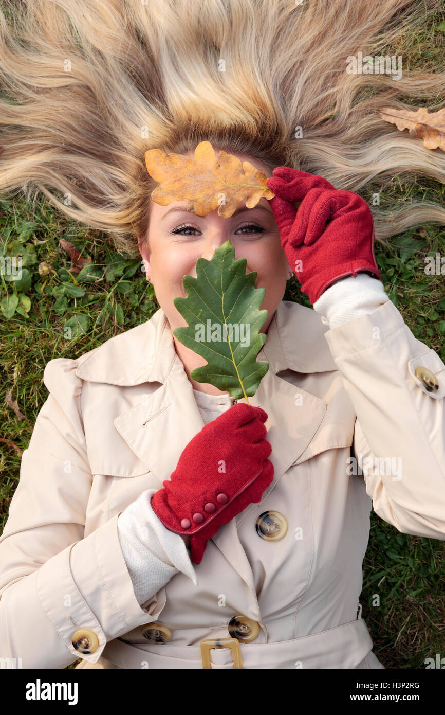 Girl face covered hair hi-res stock photography and images - Alamy