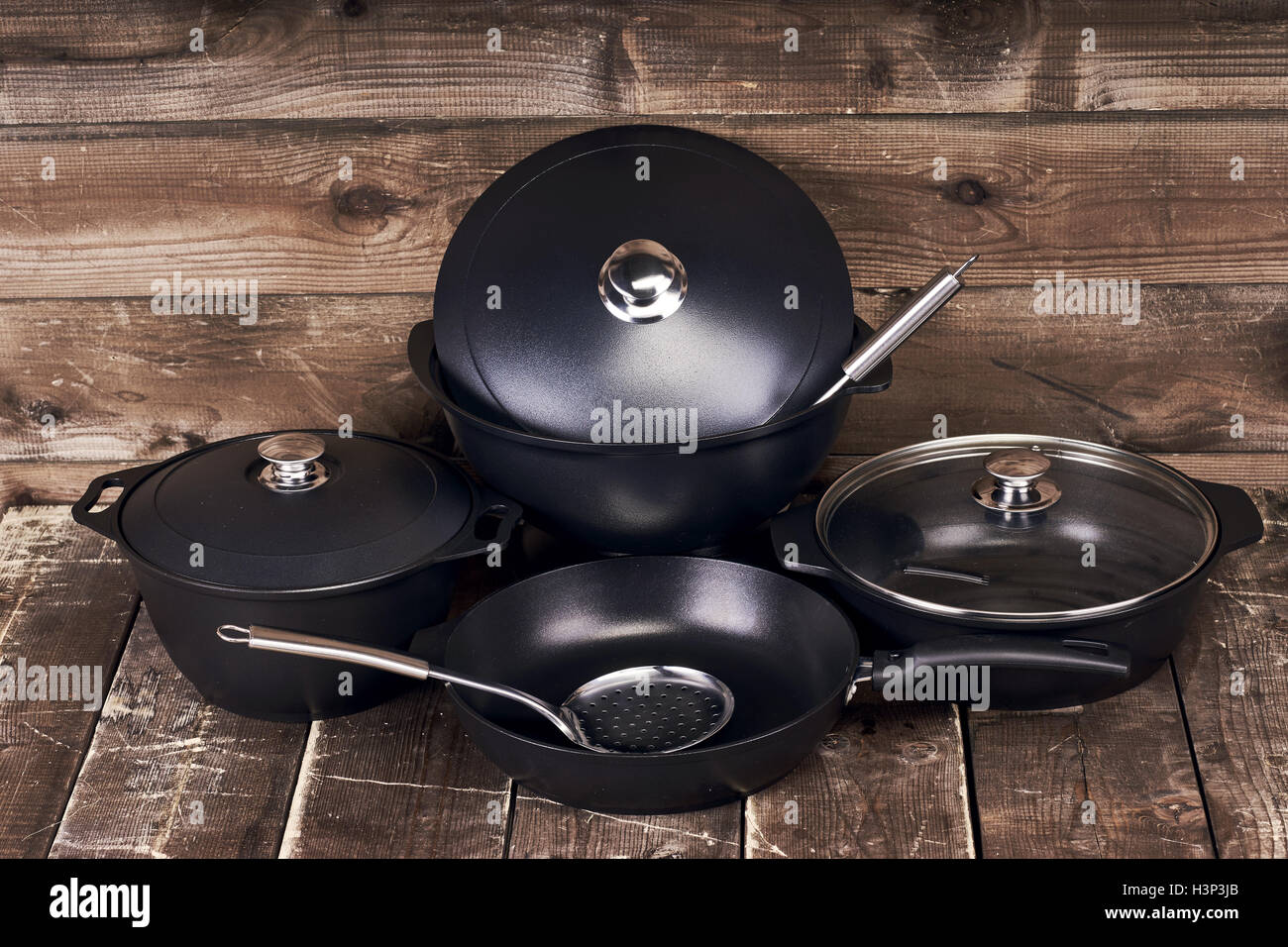 Collection of black pots Stock Photo - Alamy
