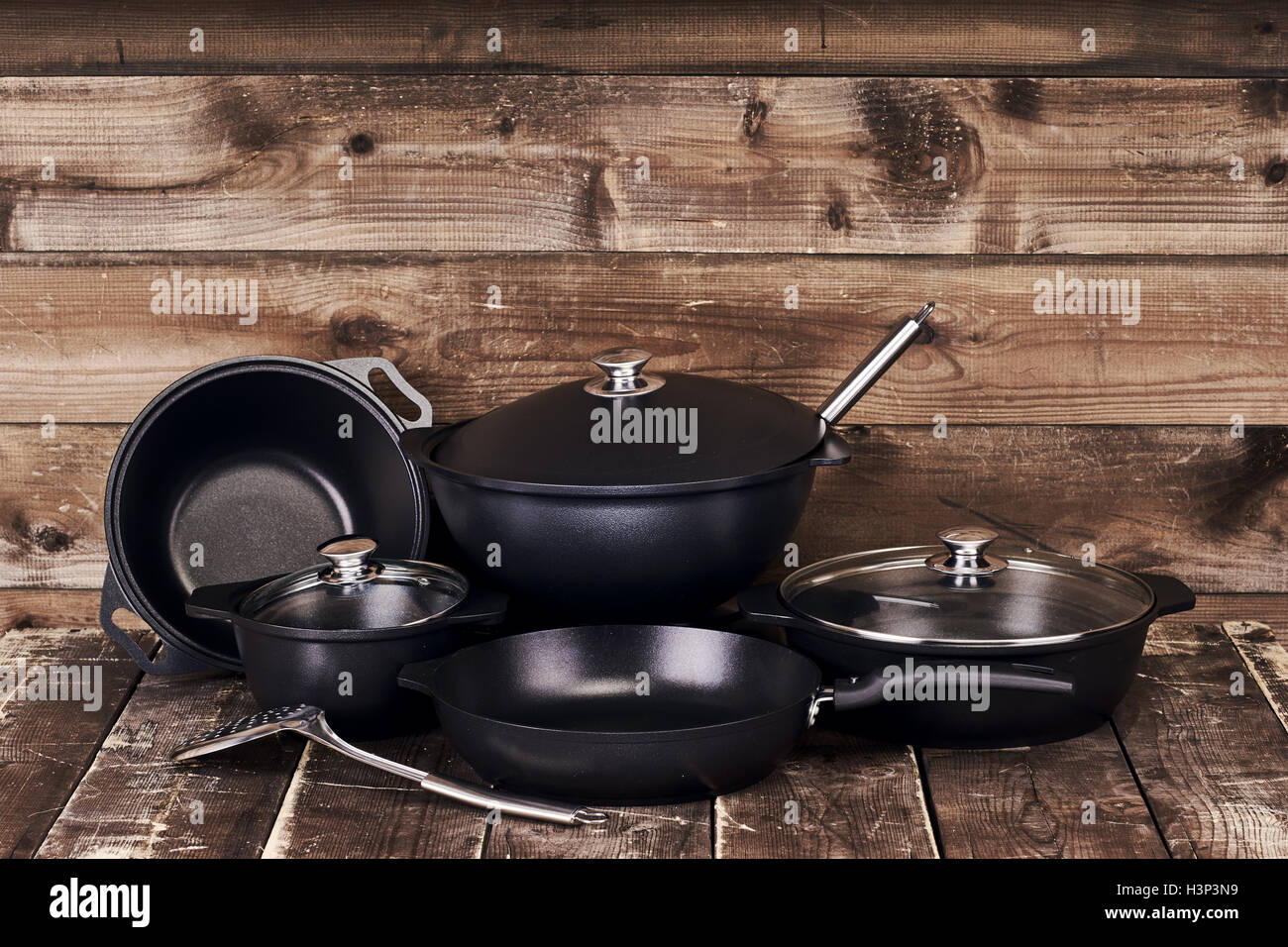 Collection of black pots Stock Photo - Alamy