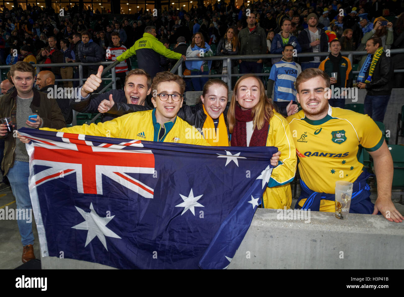 Australian fans celebrate a try during the rugby union test match ...