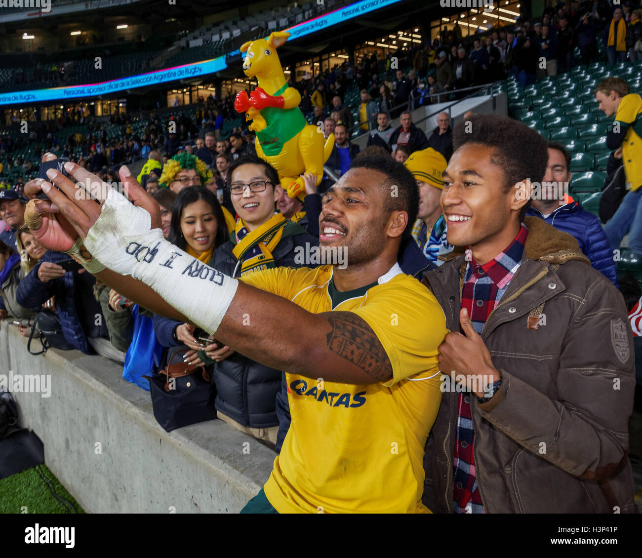 Australian fans celebrate with Samu Kerevi (13) following the rugby ...