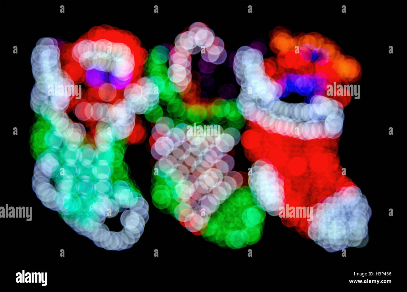 Defocused Christmas lights in the shapes of stockings Stock Photo - Alamy