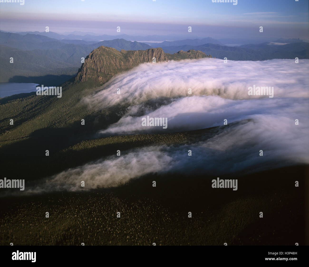 Precipitous Bluff with a cloud bank Stock Photo - Alamy