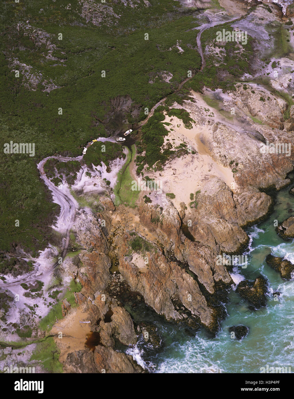 Four-wheel driving on a remote and rugged coast track Stock Photo - Alamy