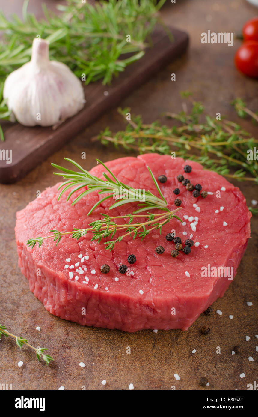 Beef meat raw with herbs and spicy Stock Photo - Alamy