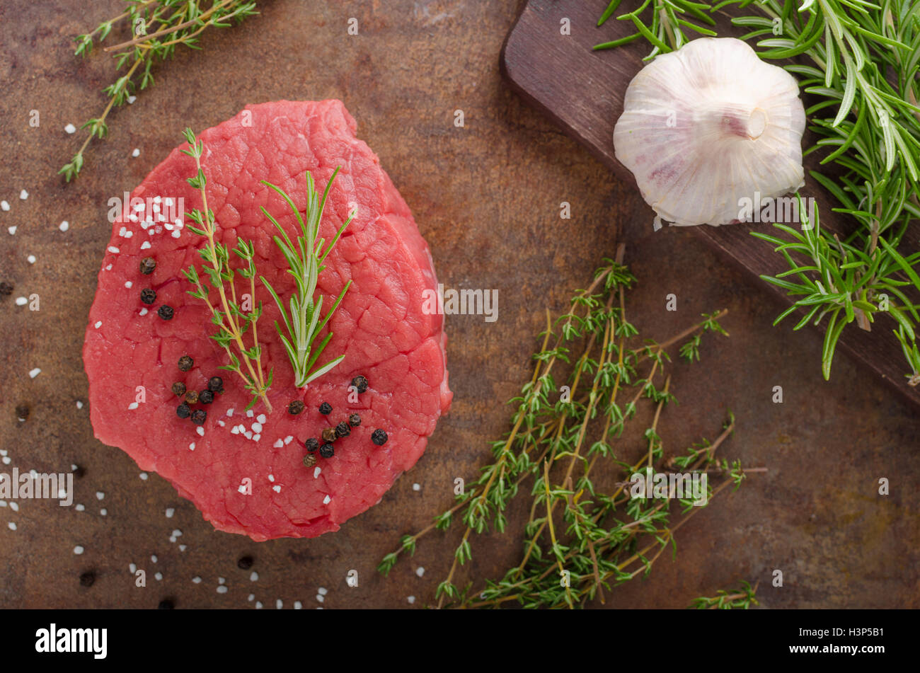 Beef meat raw with herbs and spicy Stock Photo - Alamy