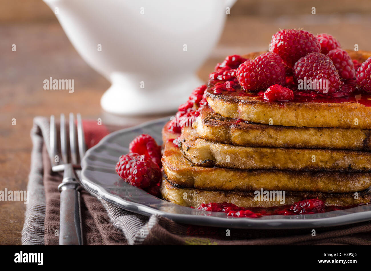 French toast with raspberry reduction sauce, all homemade Stock Photo ...