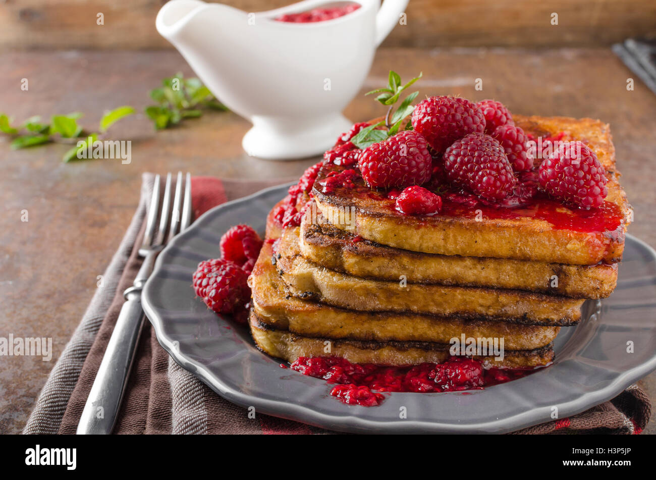 French toast with raspberry reduction sauce, all homemade Stock Photo ...