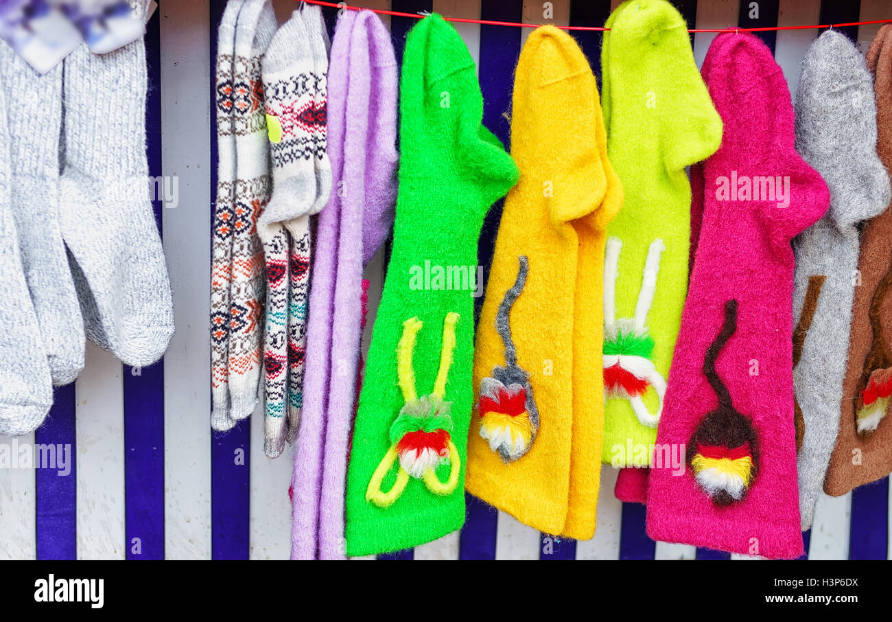 Bright knee socks hanging at the stall during the Christmas market in ...