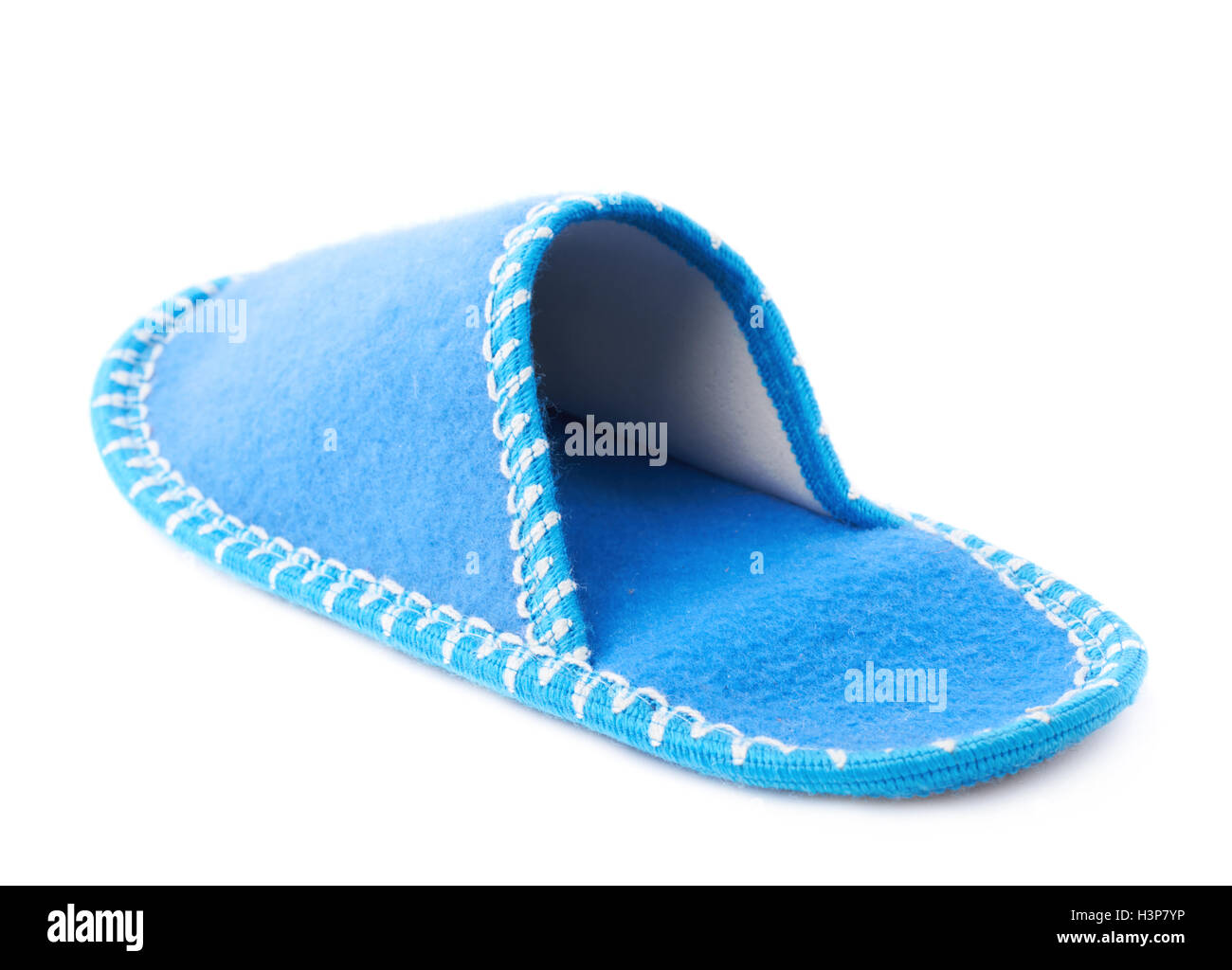 Single house slipper isolated over white background Stock Photo - Alamy