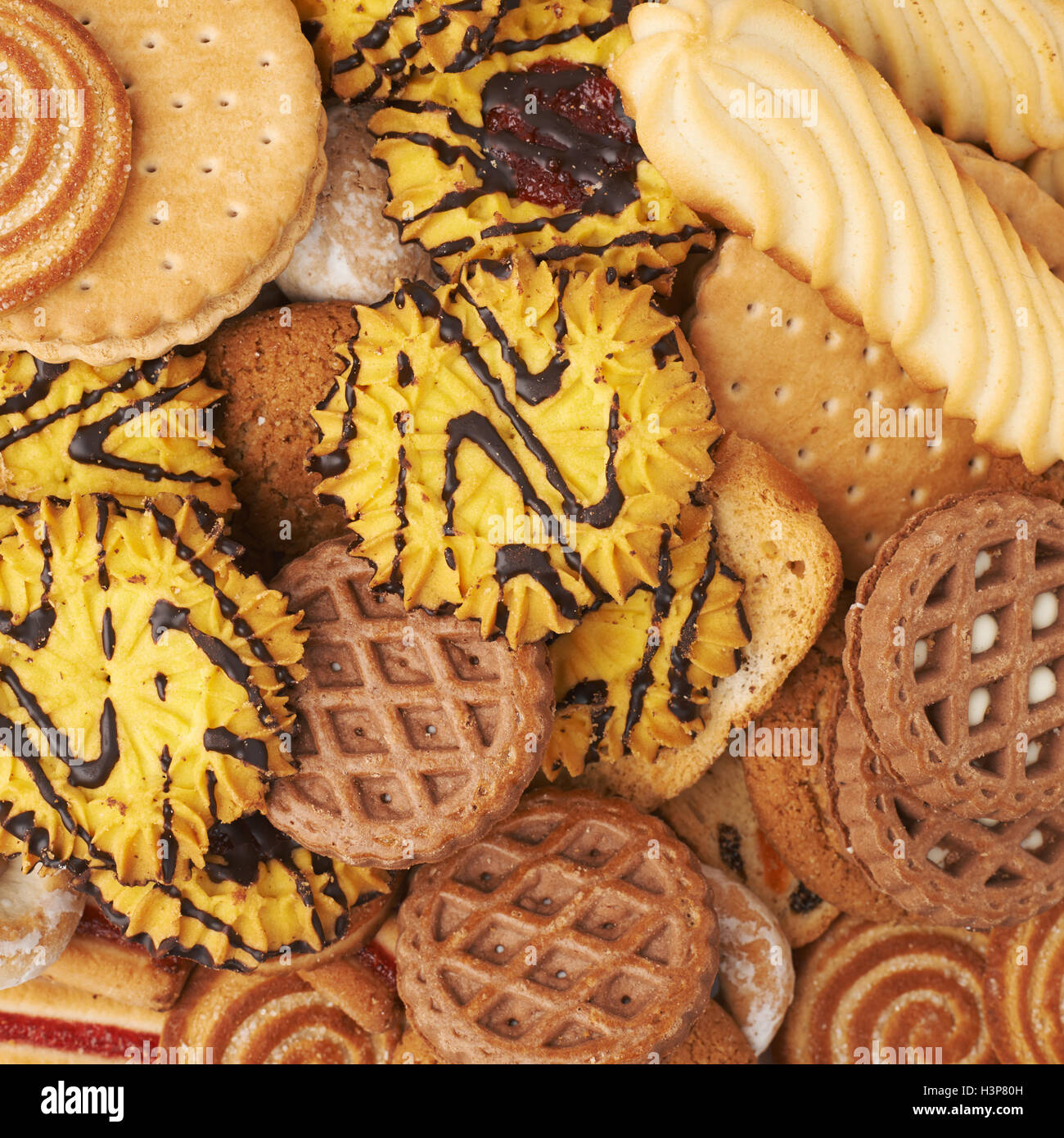 Pile of mix cookies isolated over the white background Stock Photo - Alamy
