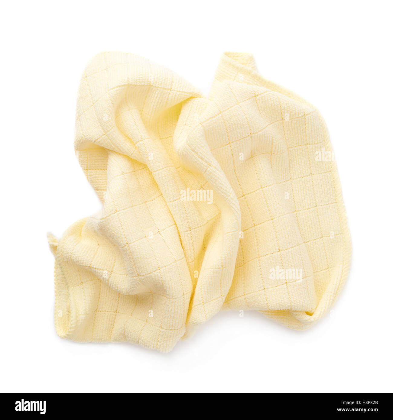 Yellow rag over white isolated background Stock Photo - Alamy