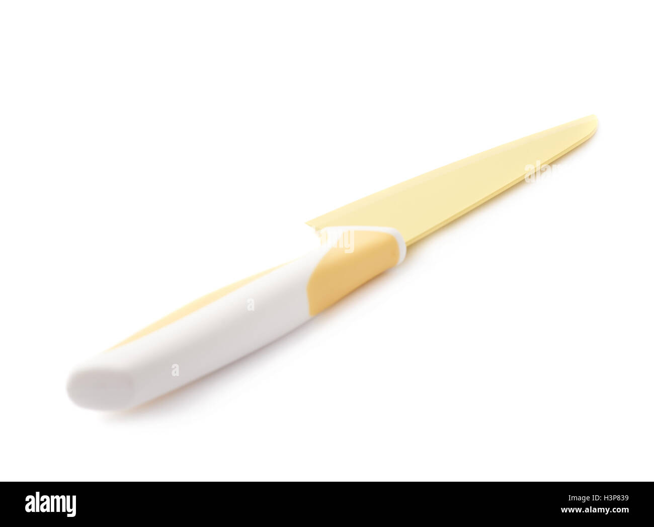 Steel yellow knife isolated over the white background Stock Photo - Alamy