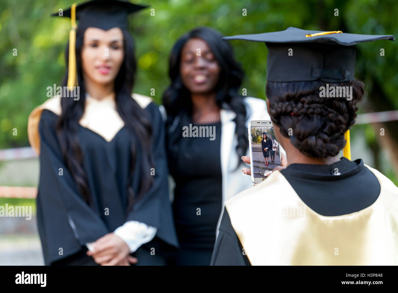 Group of students taking a picture Stock Photo - Alamy
