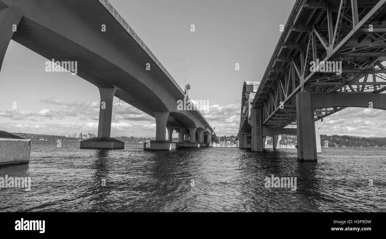 A view from under the I-90 bridge in Seattle, Washington. Black and ...
