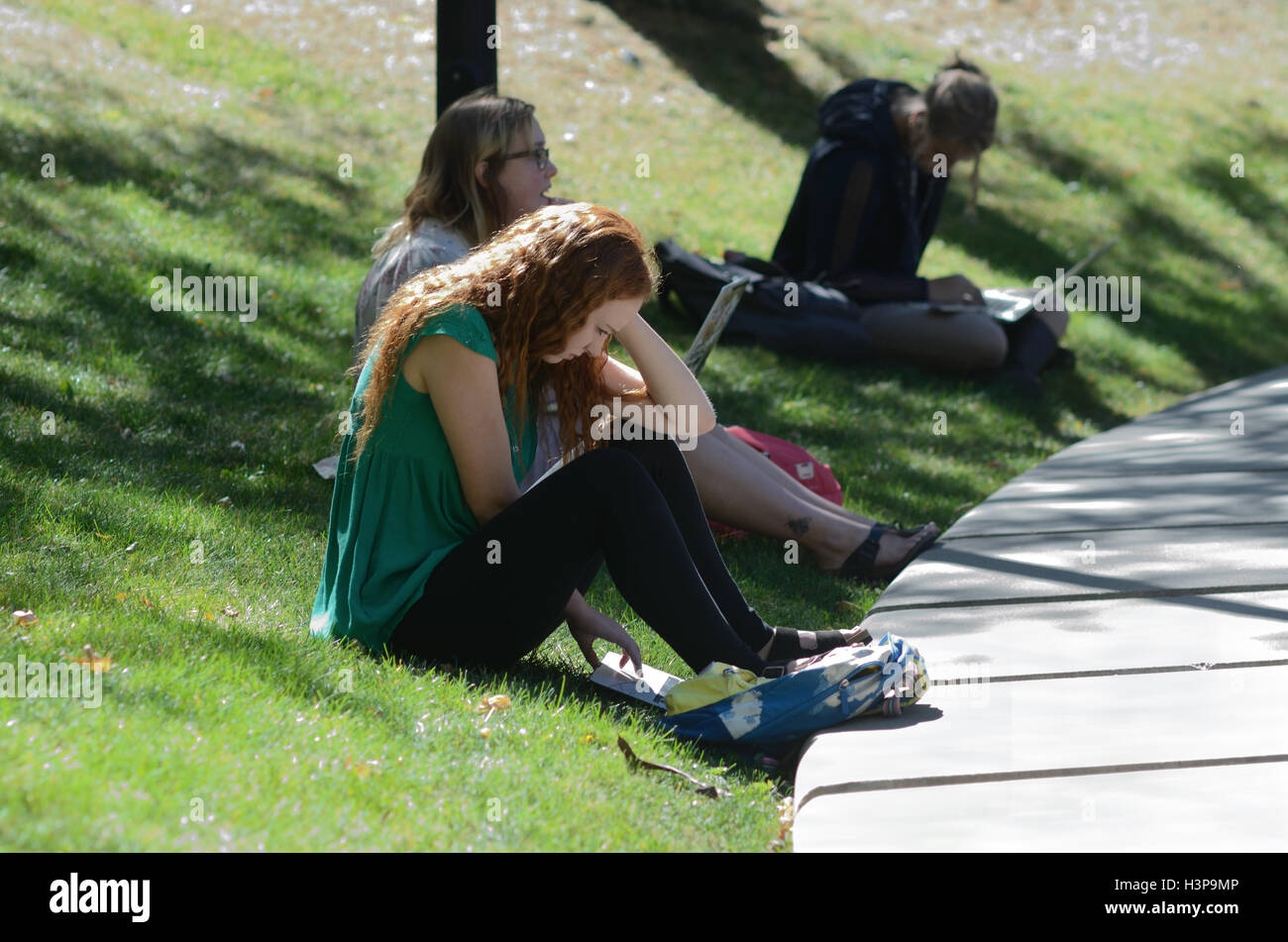 CU students enoy a warm early fall day on campus Stock Photo - Alamy