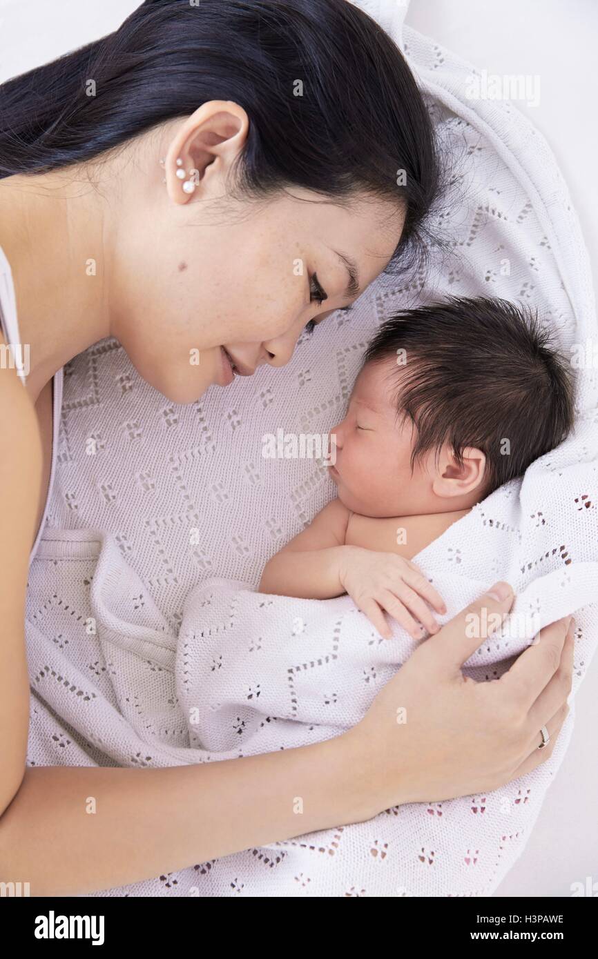 MODEL RELEASED. Mother with newborn baby girl Stock Photo - Alamy