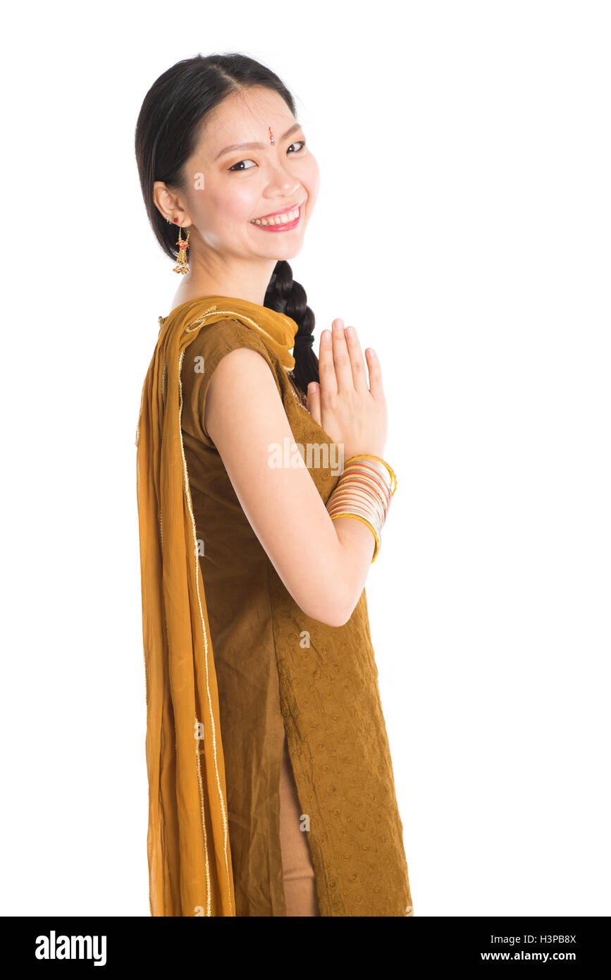 Portrait of young mixed race Indian Chinese female in traditional ...