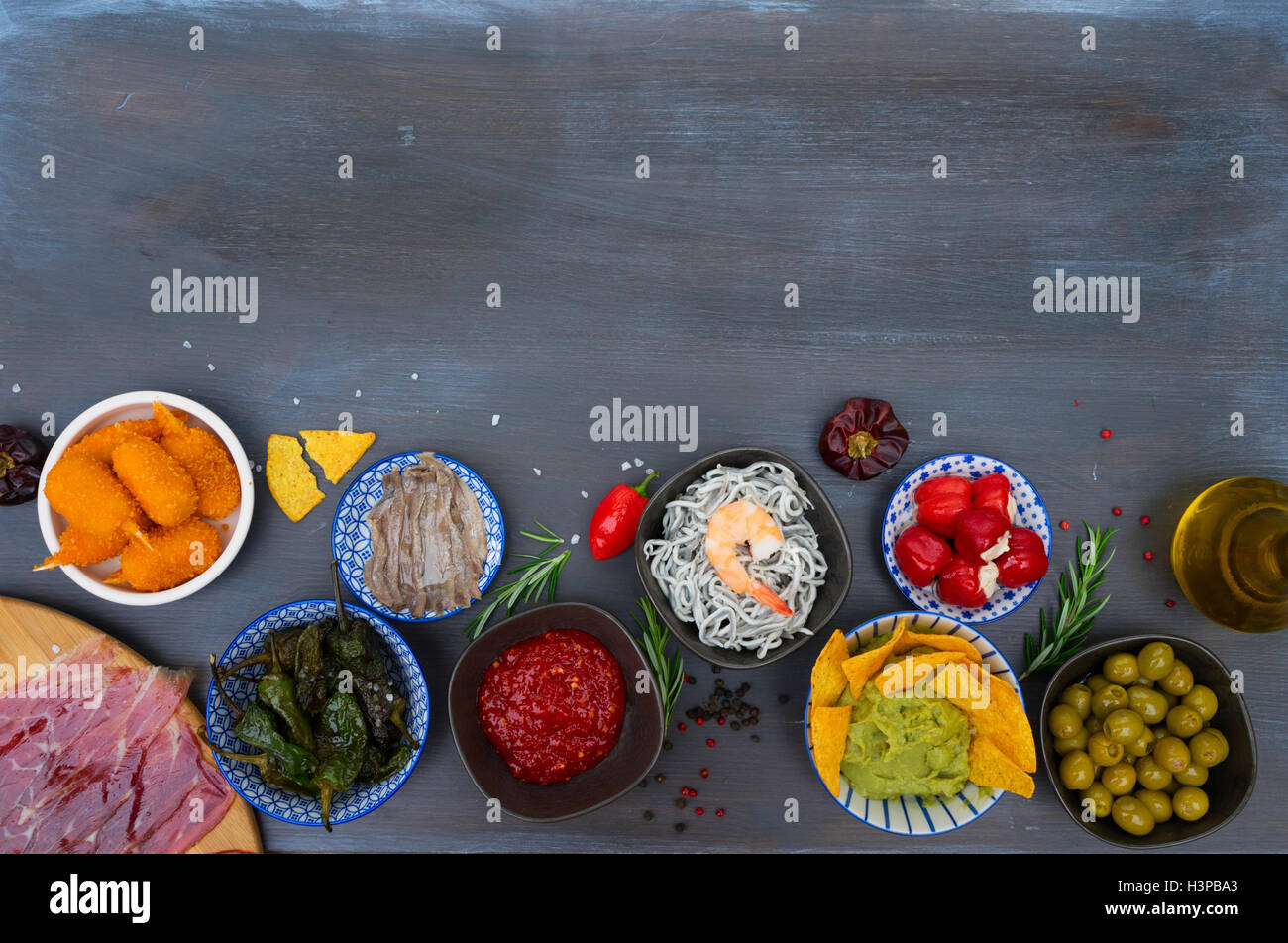 Table with spanish tapas Stock Photo - Alamy