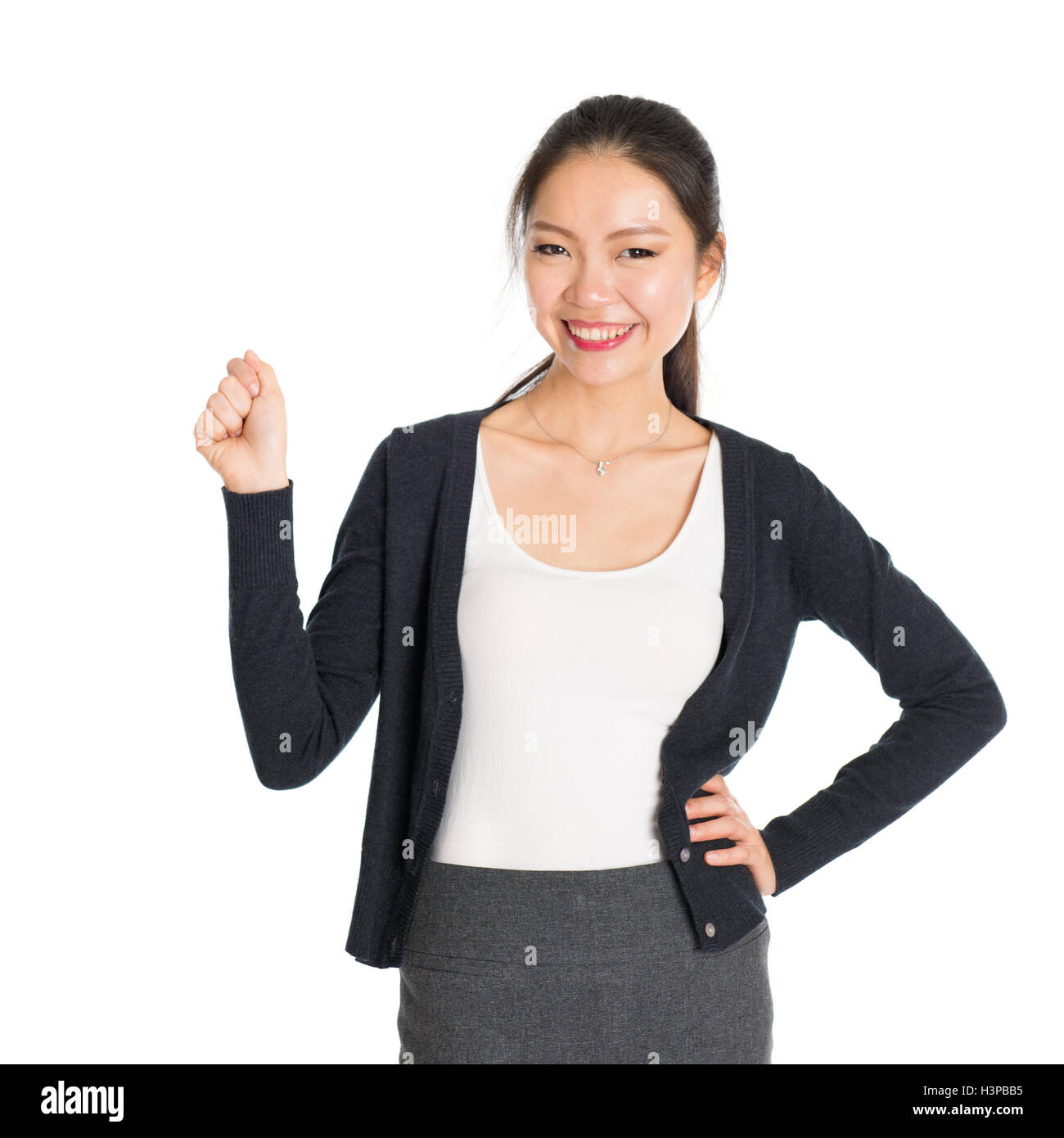 Portrait of young Asian woman hand grabbing something and smiling ...