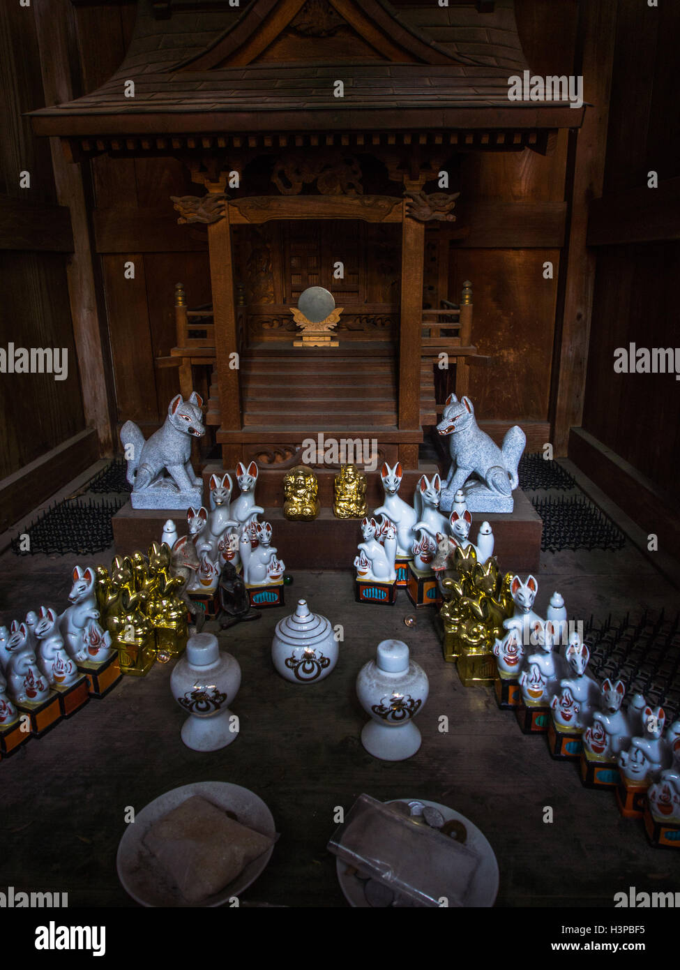 shinto roadside shrine offerings of inari tofu and kitsume fox guardian ...