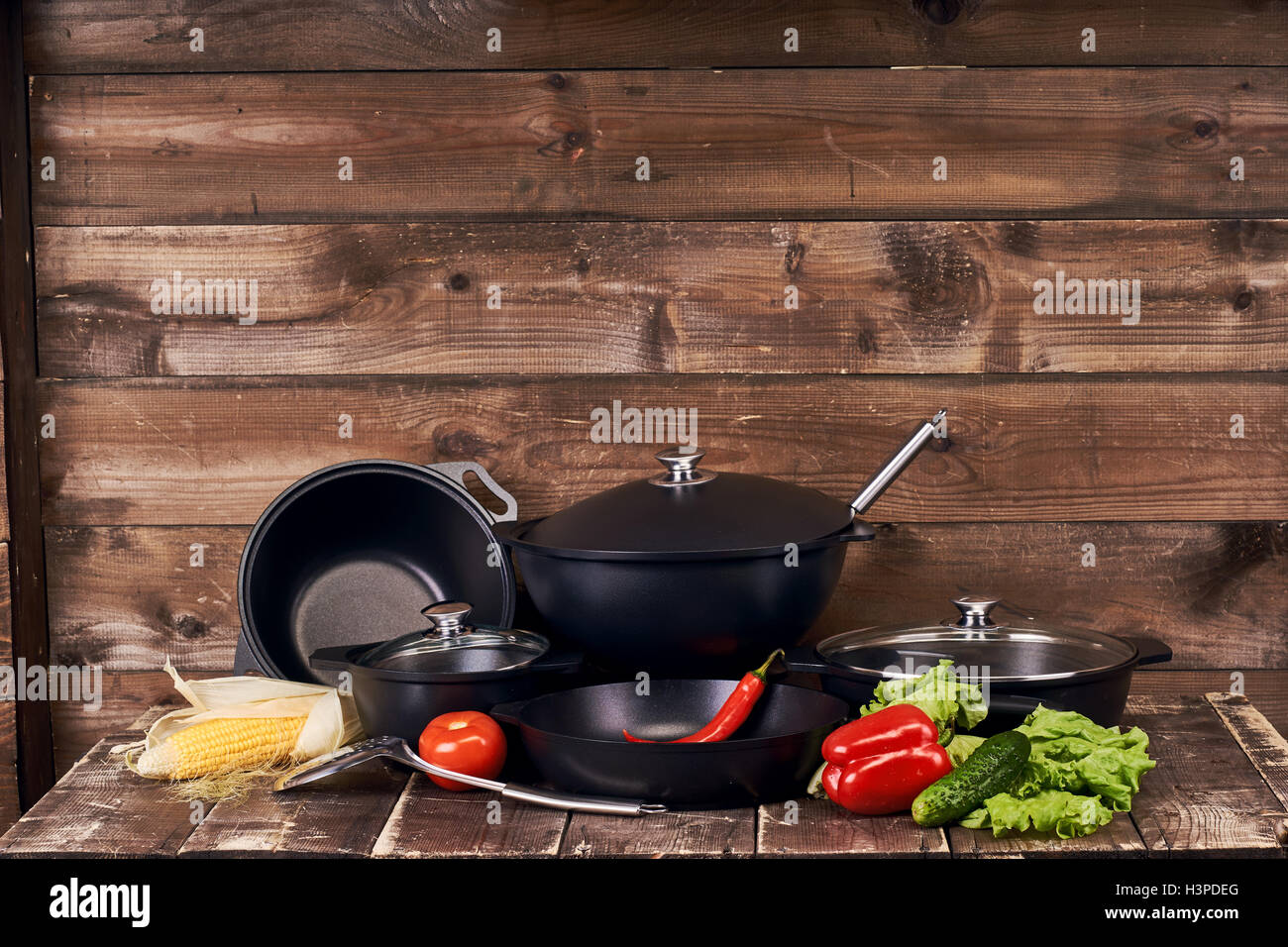 Collection of black pots Stock Photo - Alamy