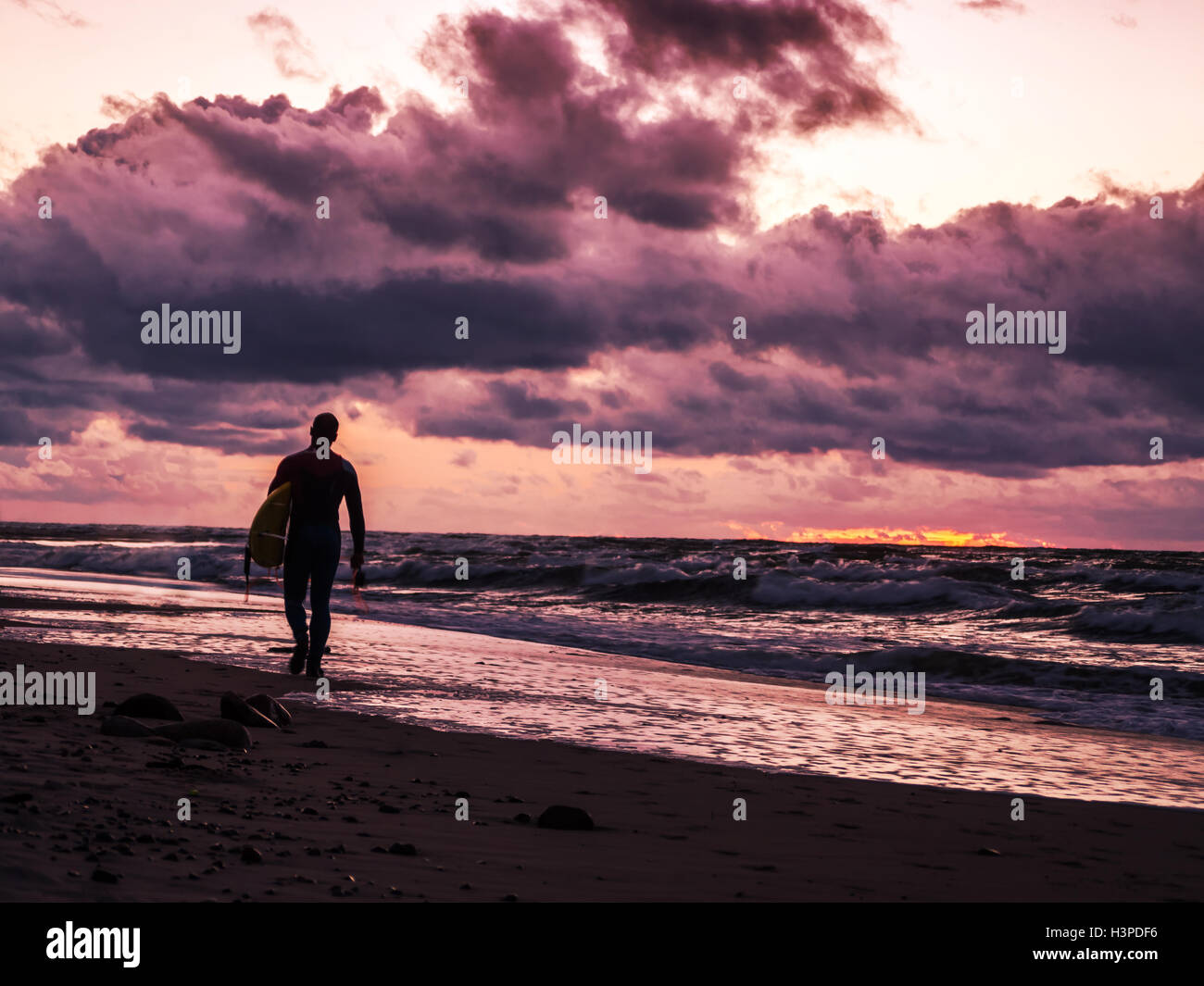 Man walking sunset hi-res stock photography and images - Alamy