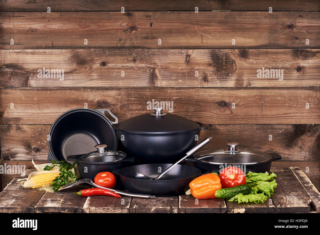 Collection of black pots Stock Photo - Alamy