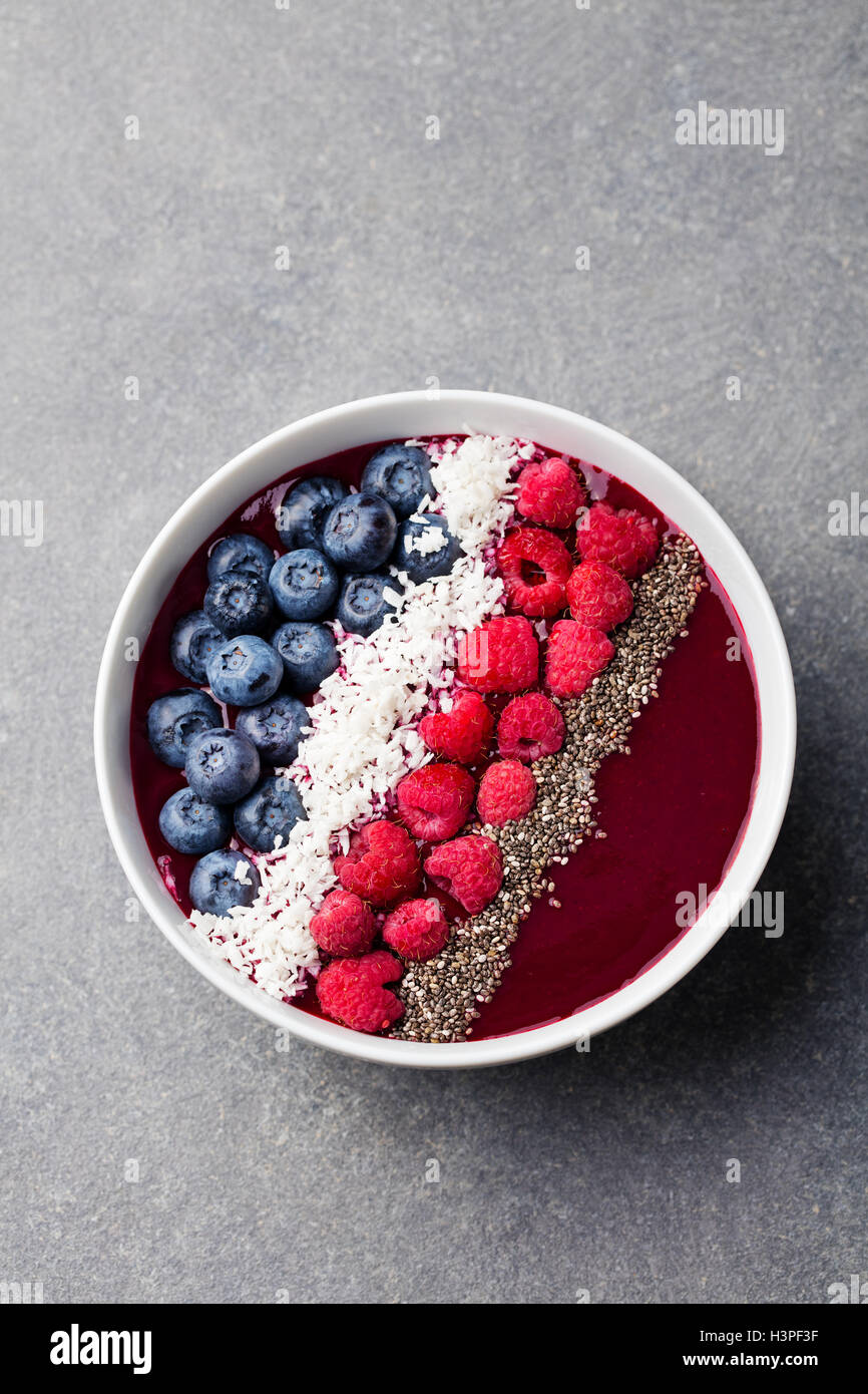 Mixed smoothie bowl raspberry blueberry chia seeds Stock Photo - Alamy