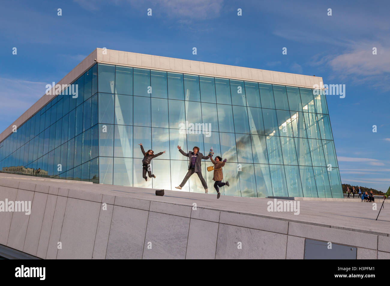 People walking on the roof of the Oslo Opera House. The Oslo Opera ...