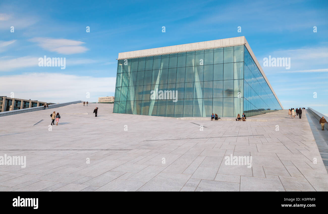 People walking on the roof of the Oslo Opera House. The Oslo Opera ...