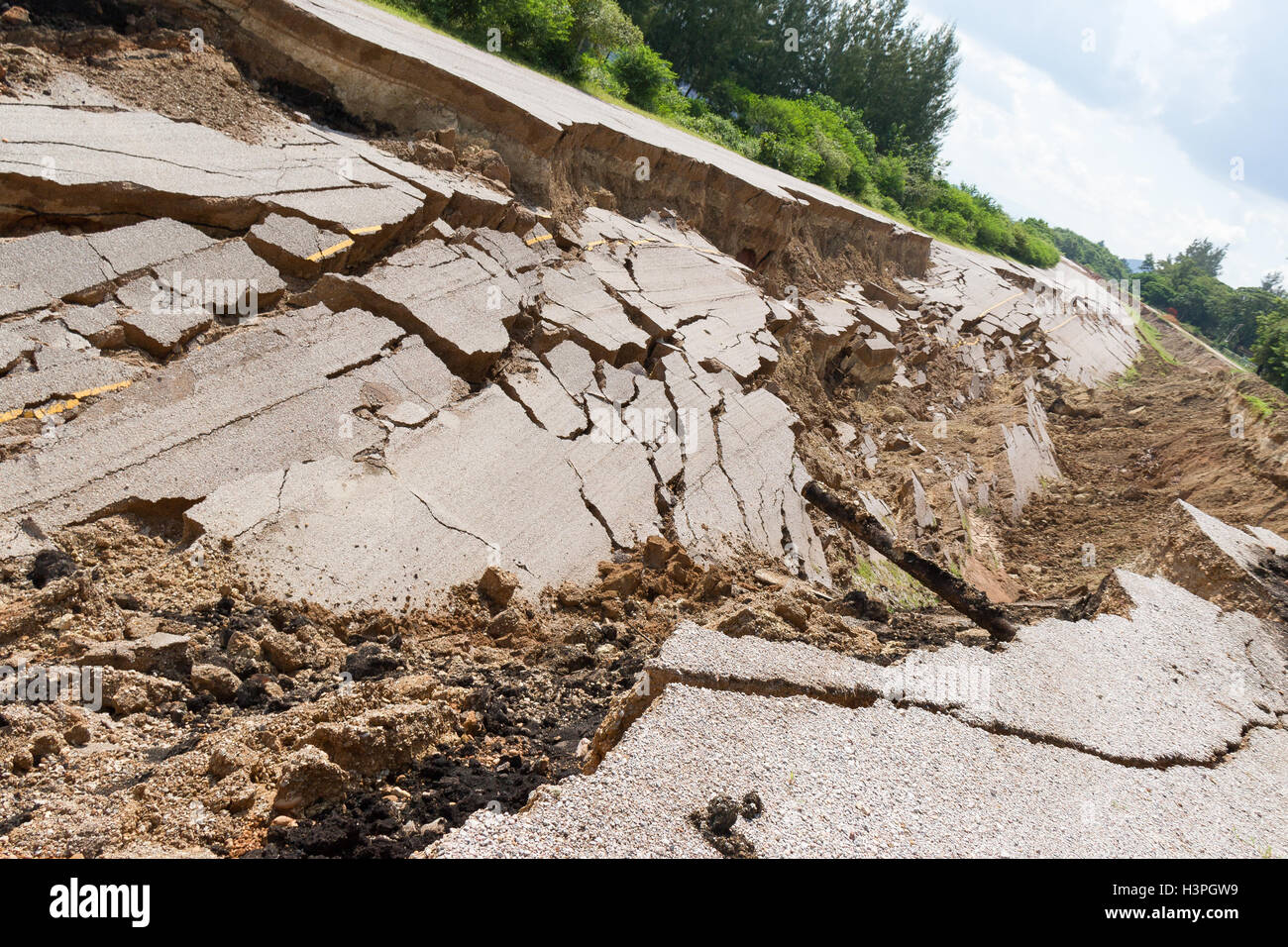 asphalt road collapsed and fallen, since the ground collapsing Stock ...